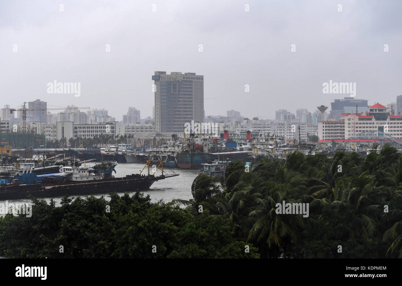 Haikou, China's Hainan Province. 15th Oct, 2017. Fishing boats dock at ...