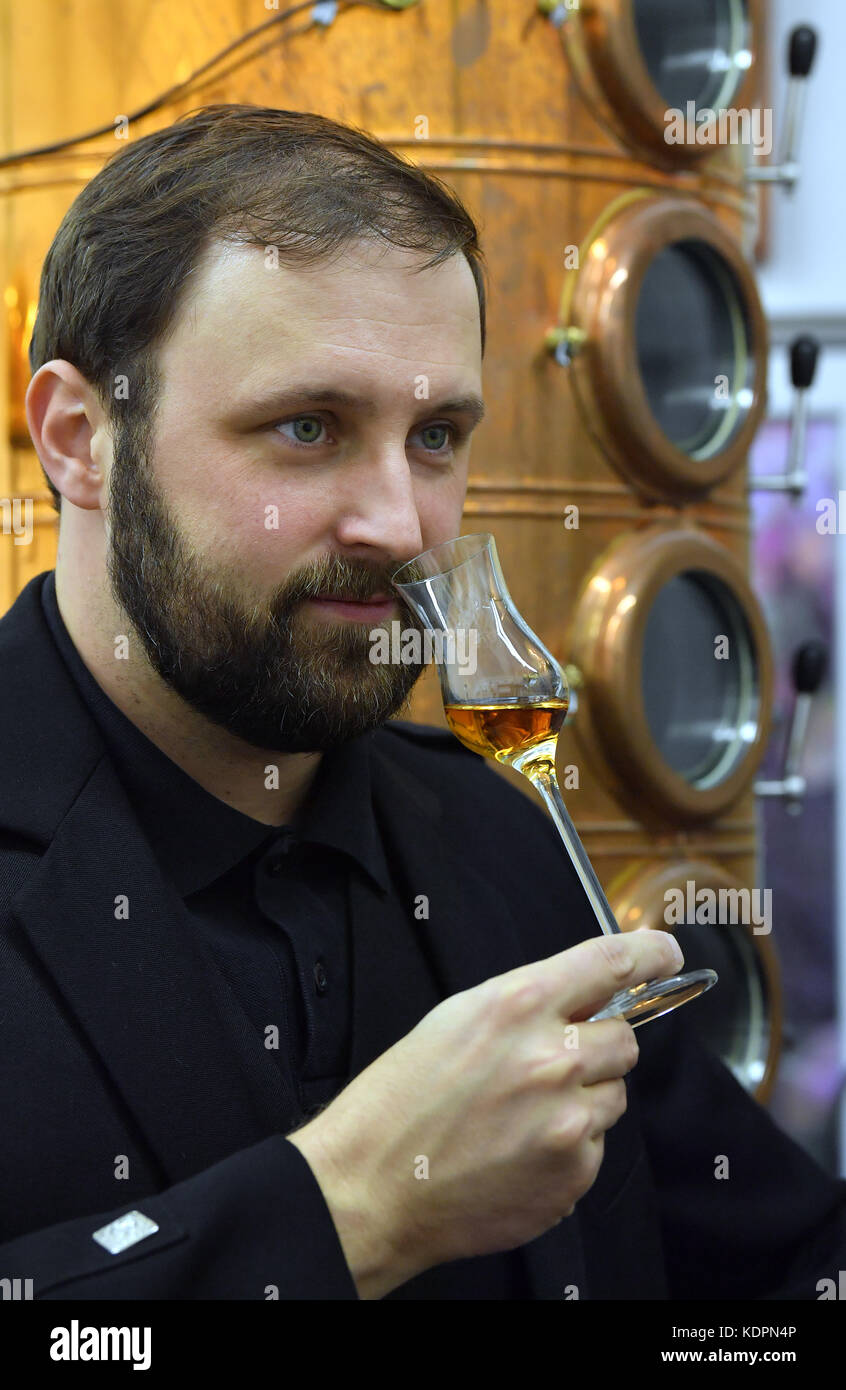 Zeitz, Germany. 10th Oct, 2017. Daniel Rost, master distiller, tasting ...