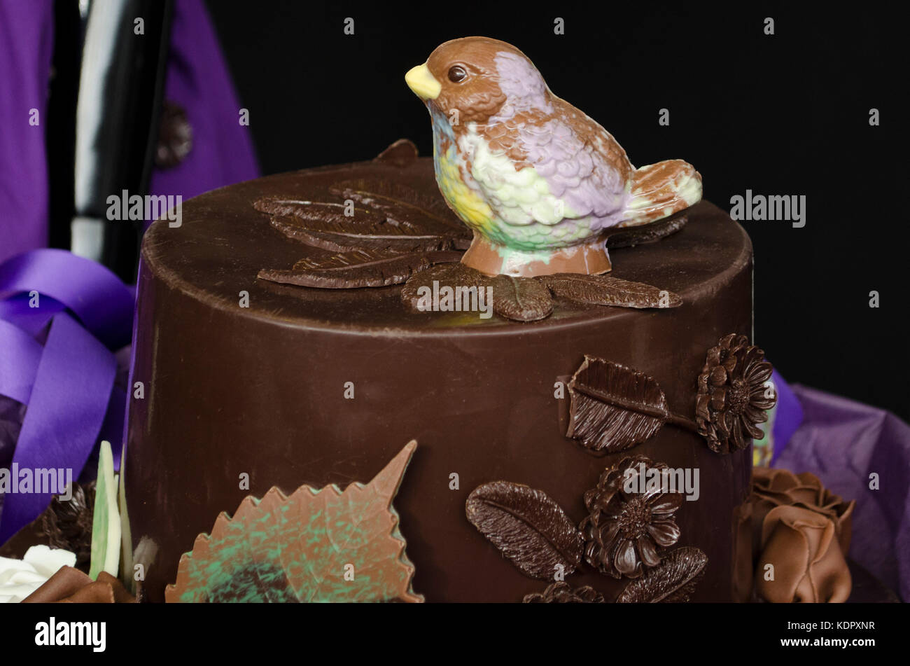 Bird on a chocolate top hat at The Chocolate Show 2017. Chocolate fans ...