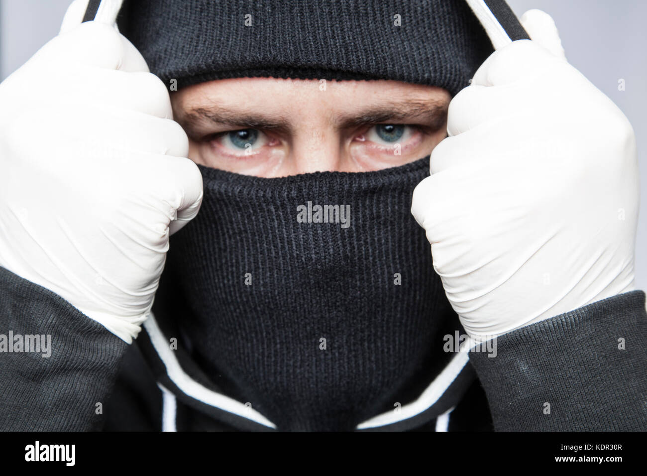 criminal assumes the hood Stock Photo - Alamy