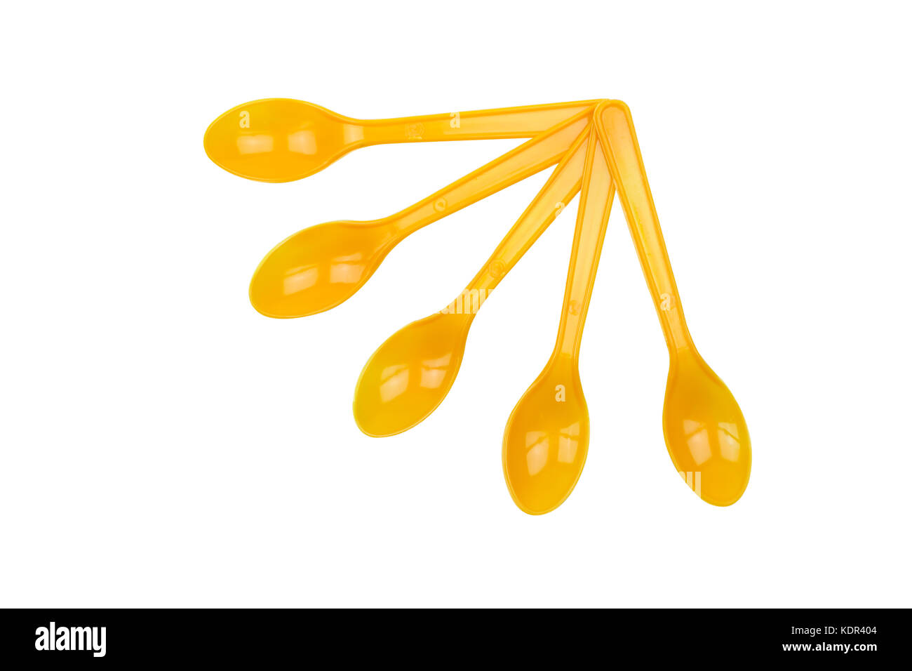 Orange plastic spoon isolated on white background Stock Photo - Alamy