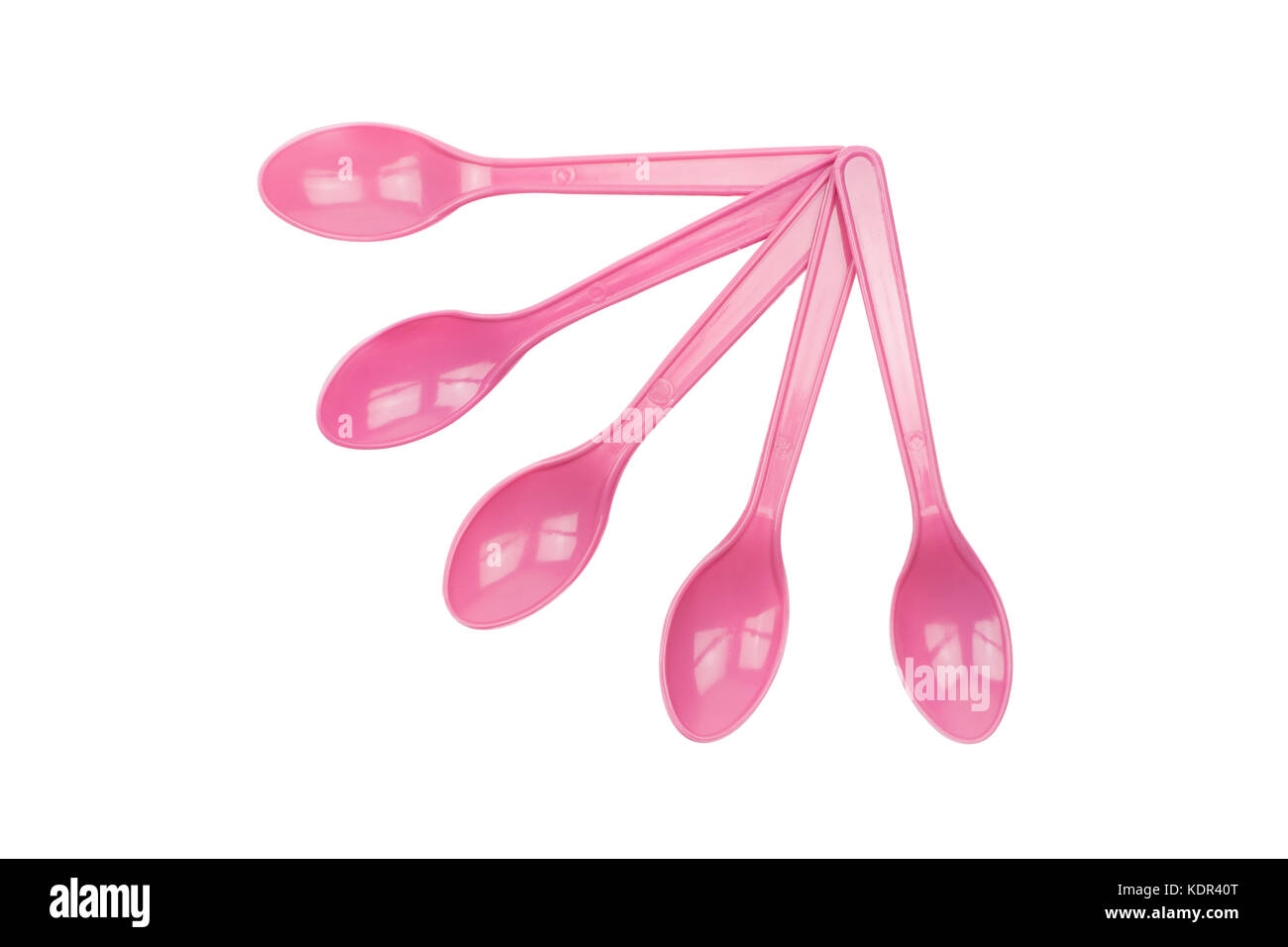 Pink plastic spoon isolated on white background Stock Photo - Alamy
