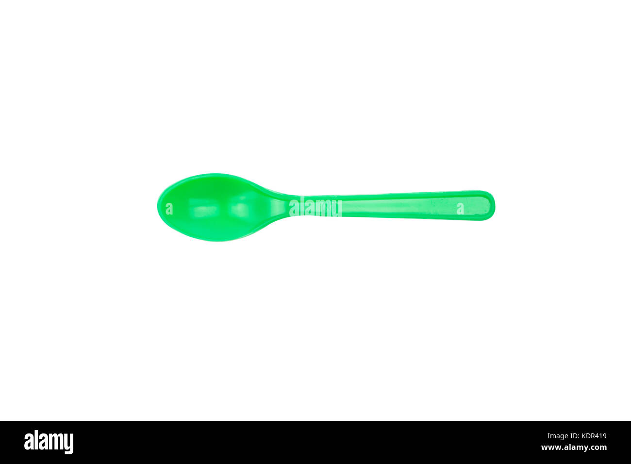 Green plastic spoon isolated on white background Stock Photo - Alamy
