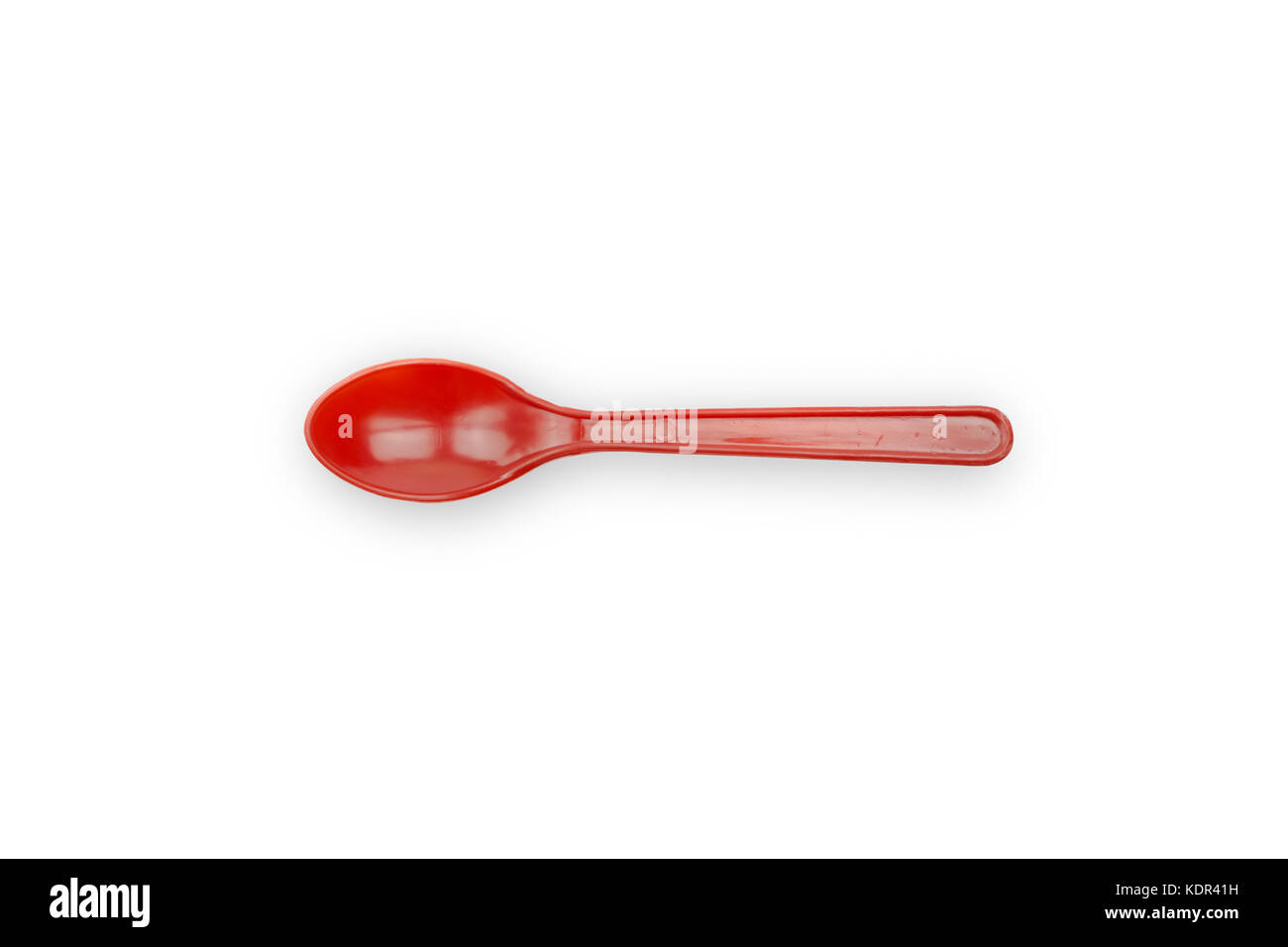 Red plastic spoon isolated on white background Stock Photo - Alamy