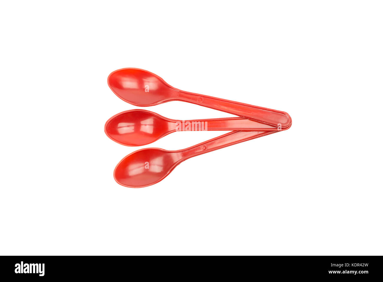 Red plastic spoon isolated on white background Stock Photo - Alamy