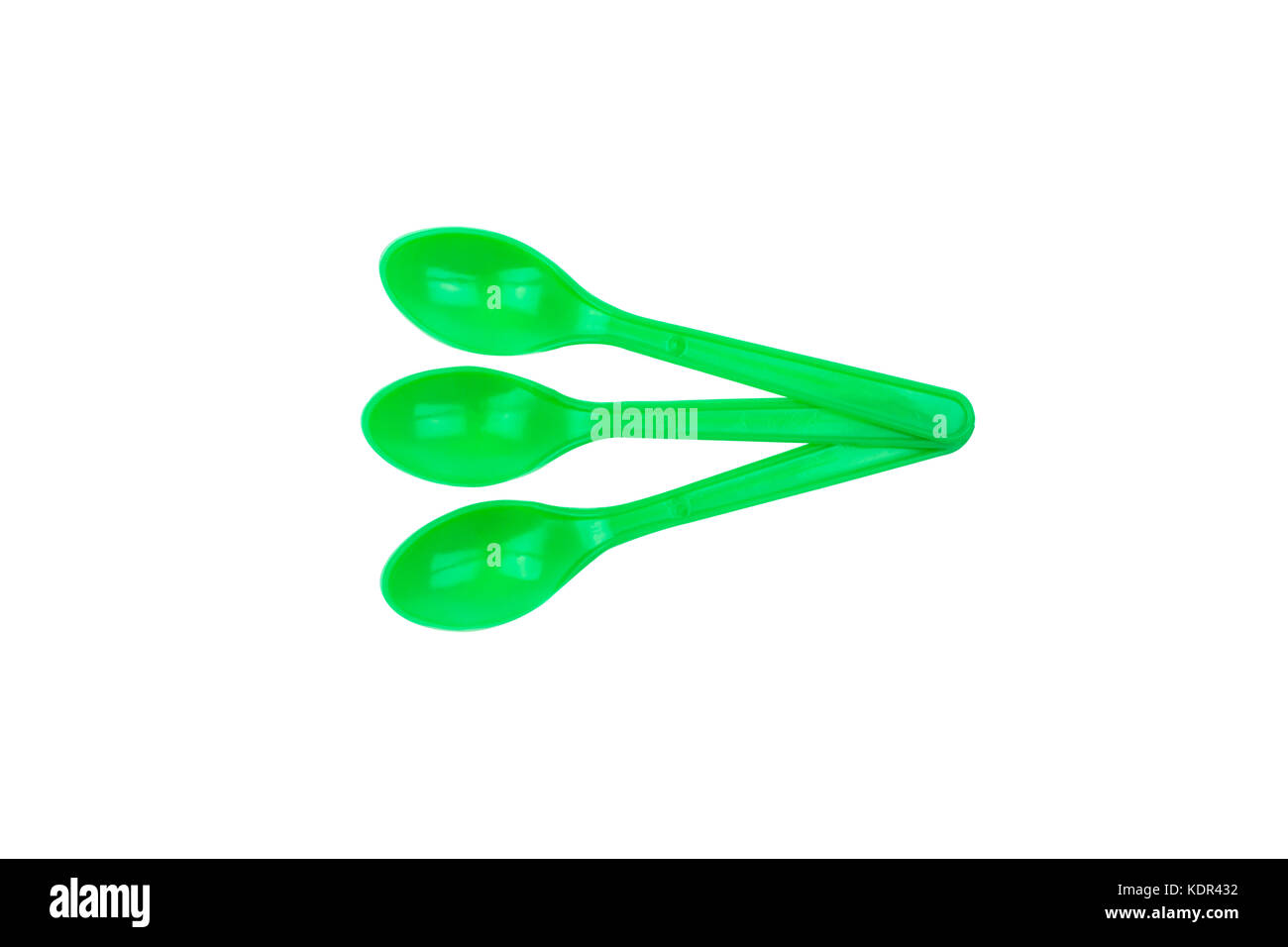 Green plastic spoon isolated on white background Stock Photo - Alamy