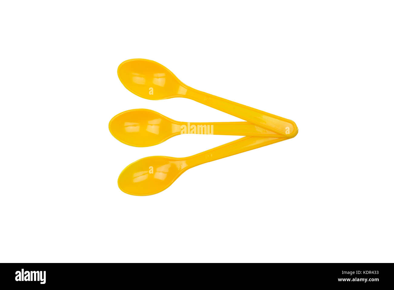 Orange plastic spoon isolated on white background Stock Photo - Alamy