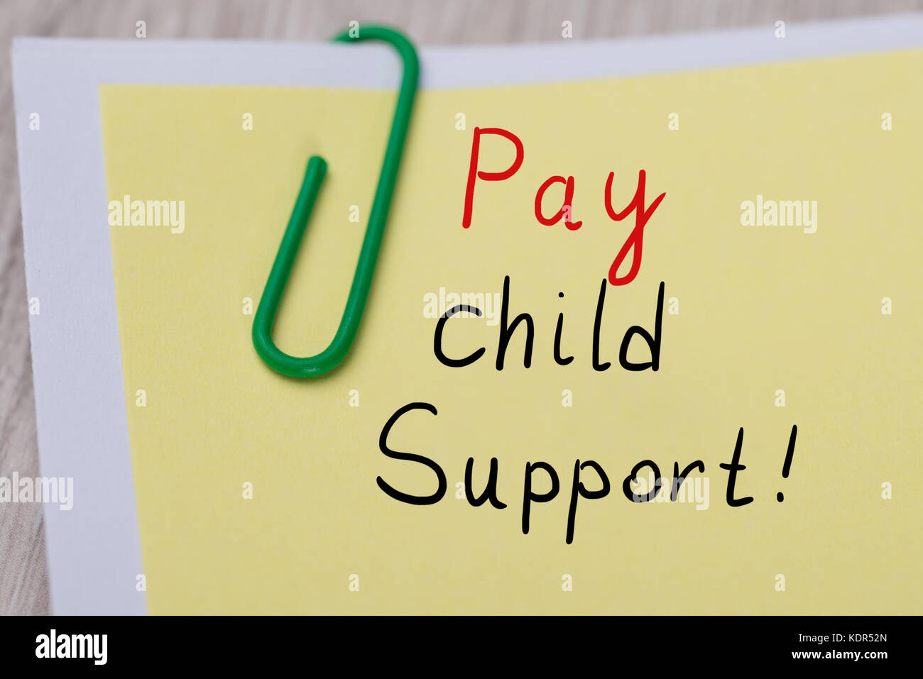 Note attached to child hi-res stock photography and images - Alamy