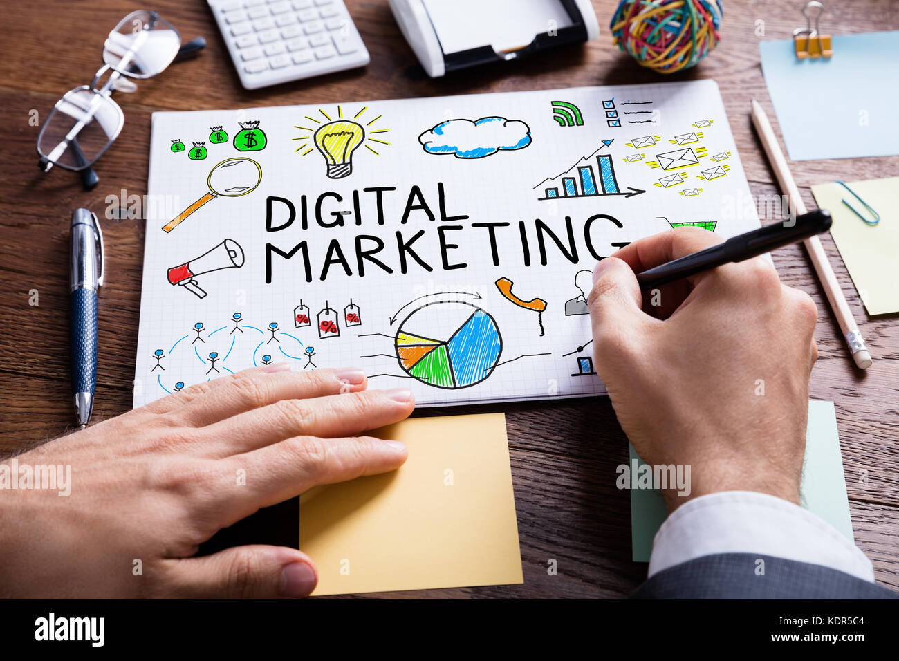 High Angle View Of Businessperson Hand Drawing Digital Marketing ...