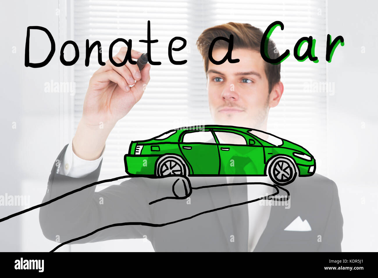 Close-up Of Businessman Drawing Concept Of Car Donation On Transparent ...