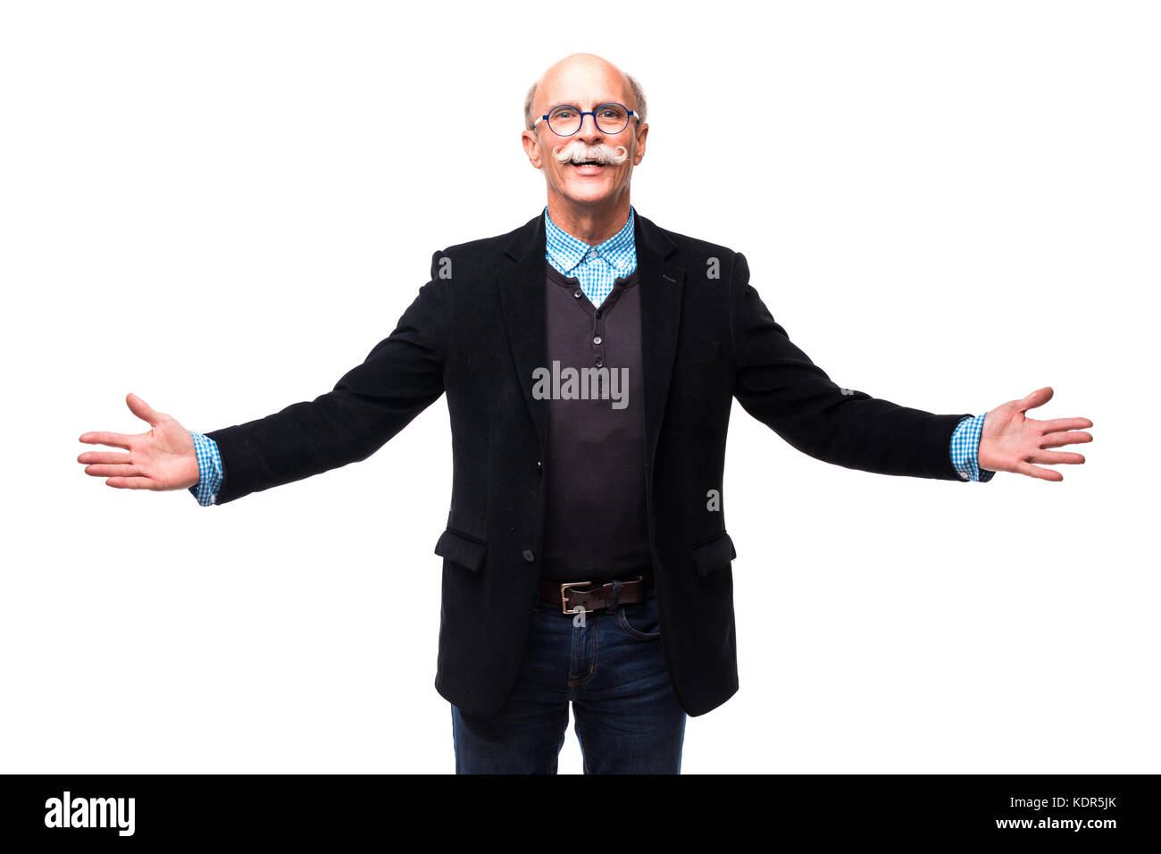 senior business man says welcome with his arms Stock Photo - Alamy