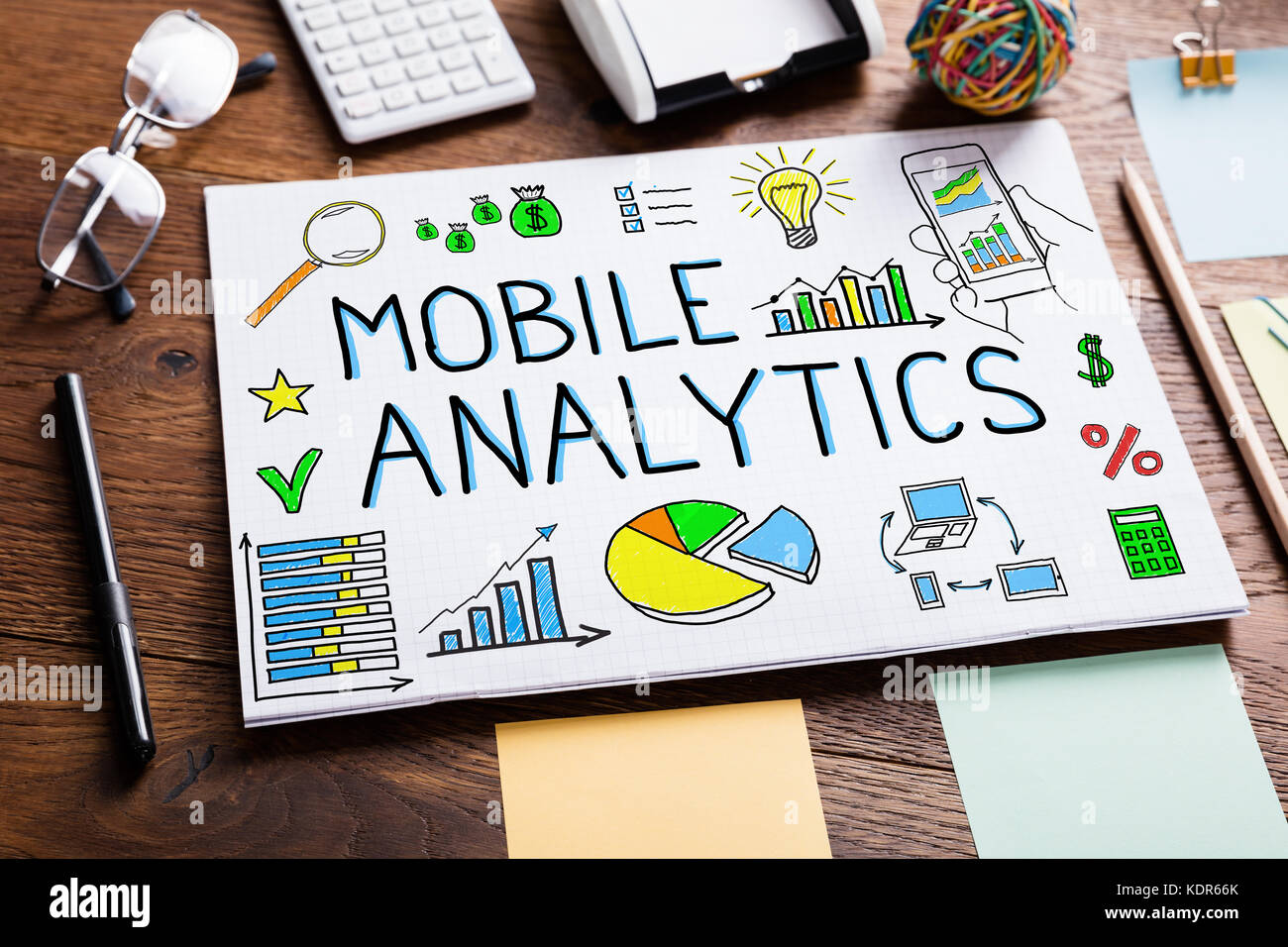 High Angle View Of Illustrative Diagram Of Mobile Analytics Concept On ...