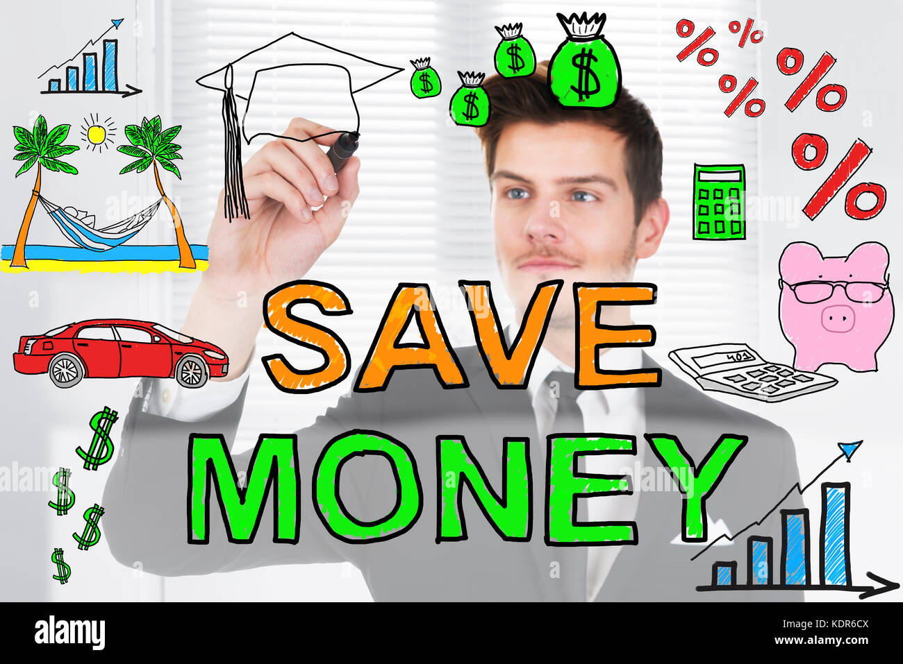 Close-up Of Person Hand Drawing Save Money Concept On Blackboard With ...