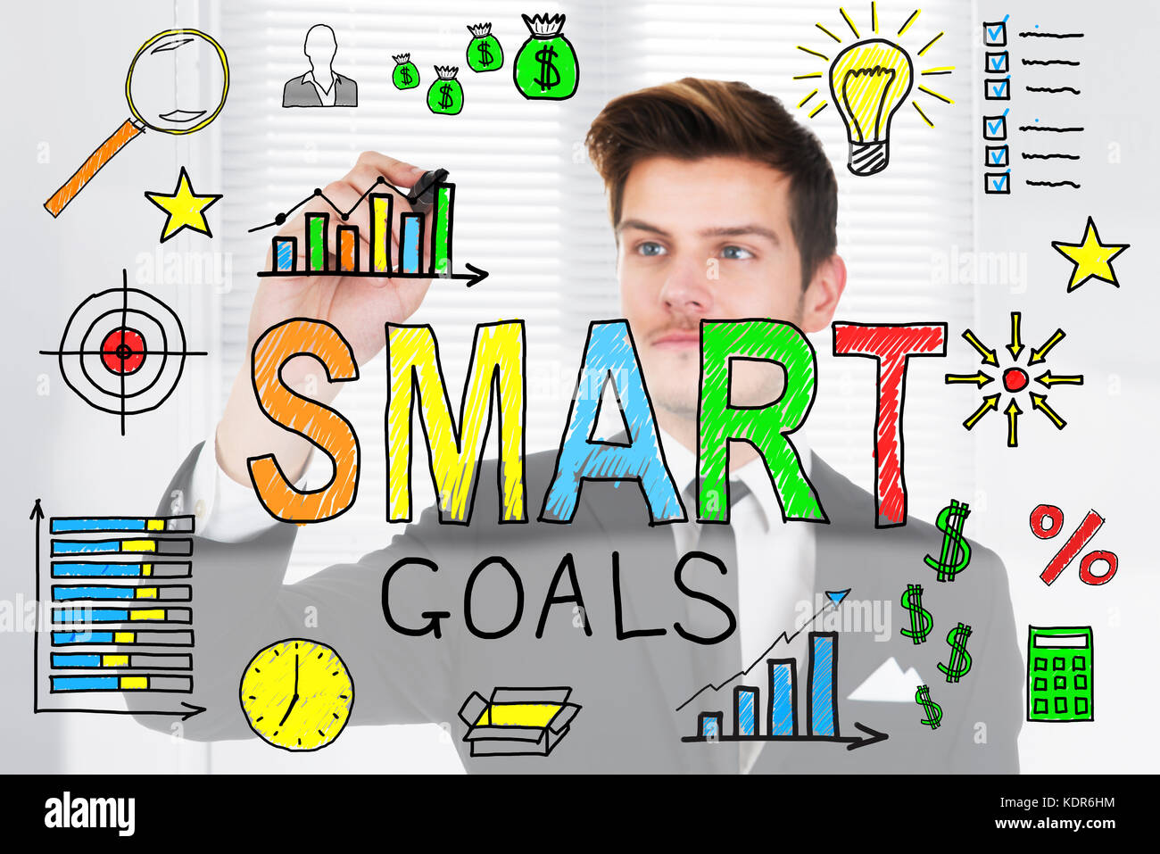 Successful Businessman Drawing Smart Goals Concept On Transparent Glass ...