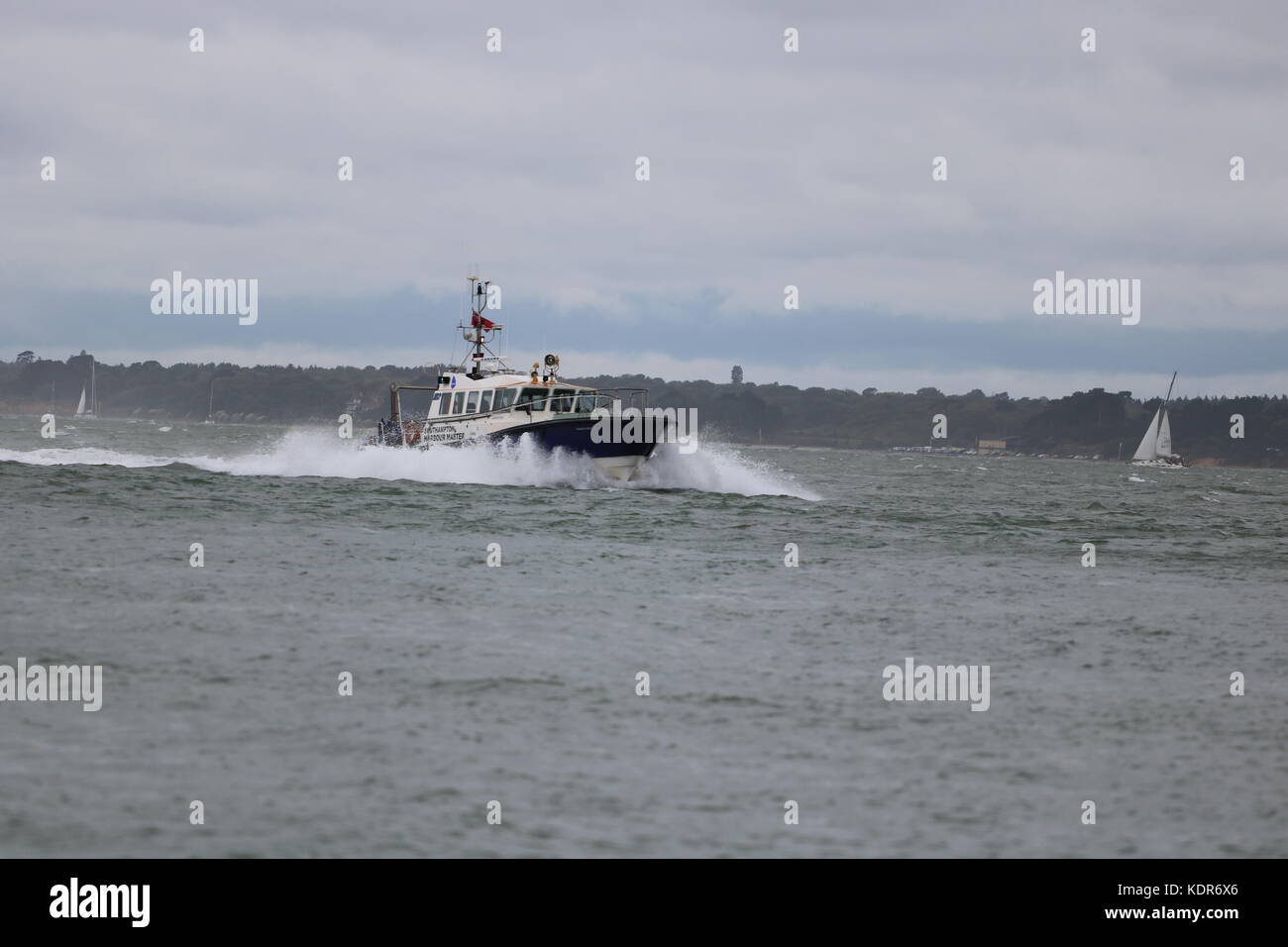The Southampton Harbour Master cutter speeds across the Solent with ...
