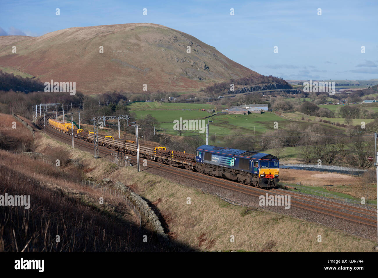 A Direct Rail services class 66 locomotive passes through the Lune ...