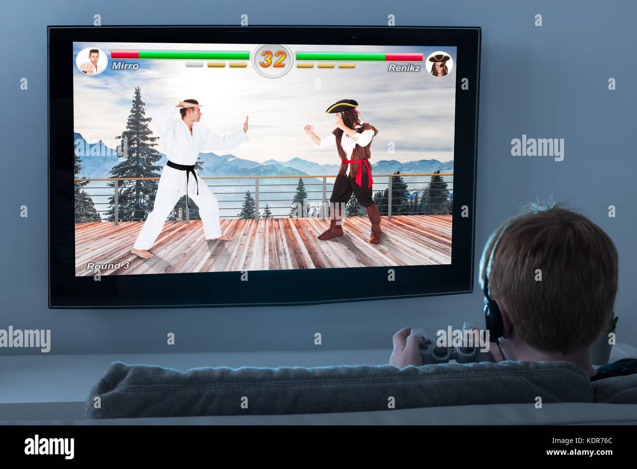Fighting for the tv remote hi-res stock photography and images - Alamy