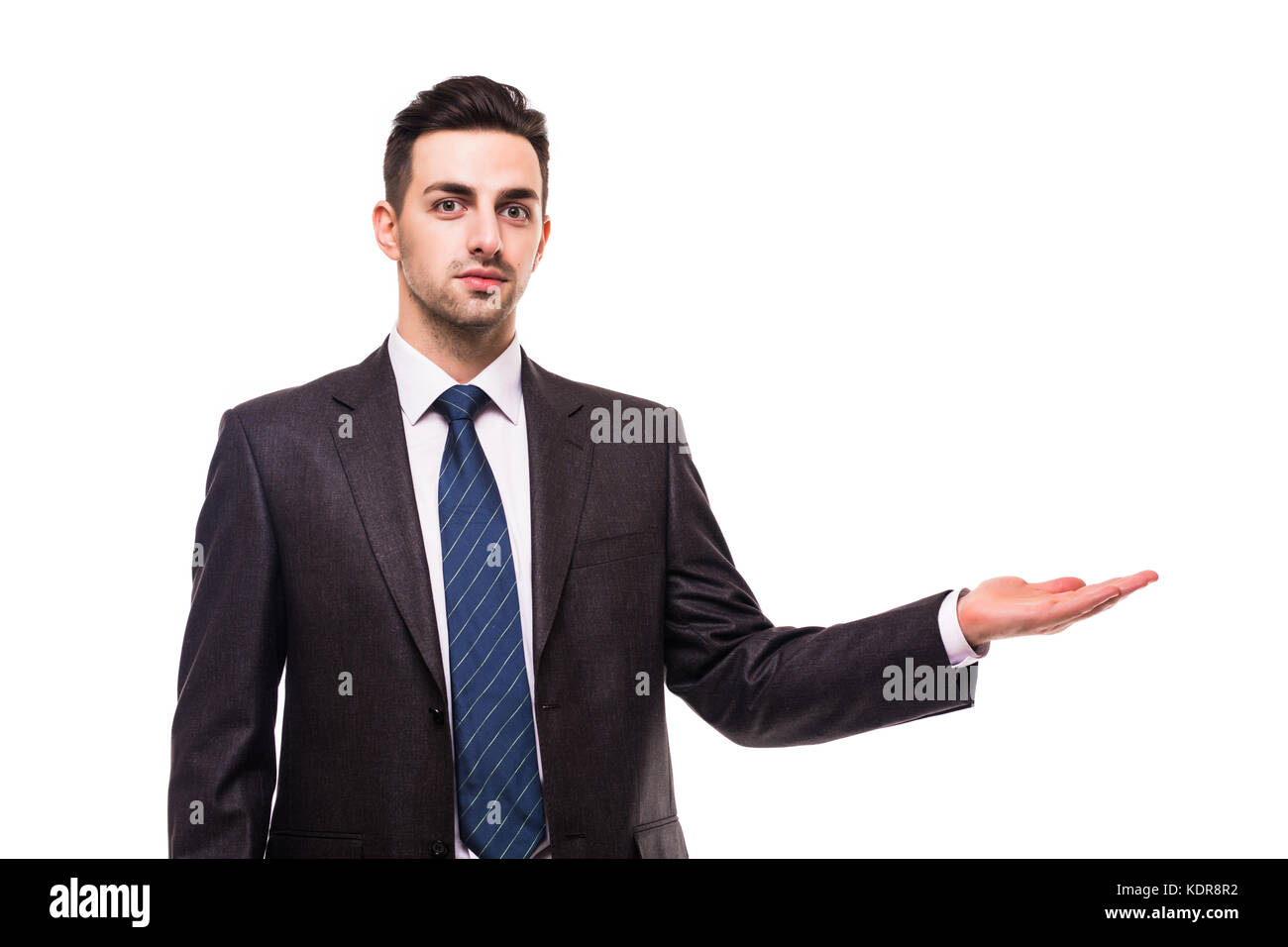 full length picture of a young business man presenting something in the ...