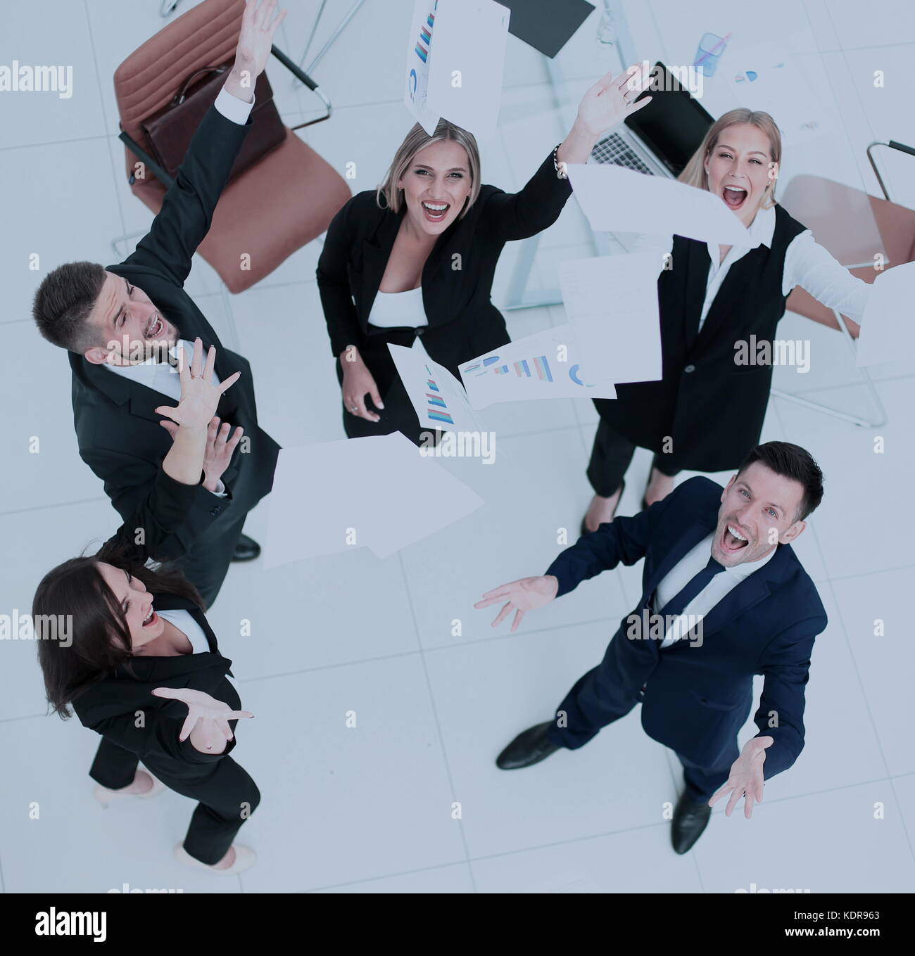 Successful business team throws into the air the documents Stock Photo ...