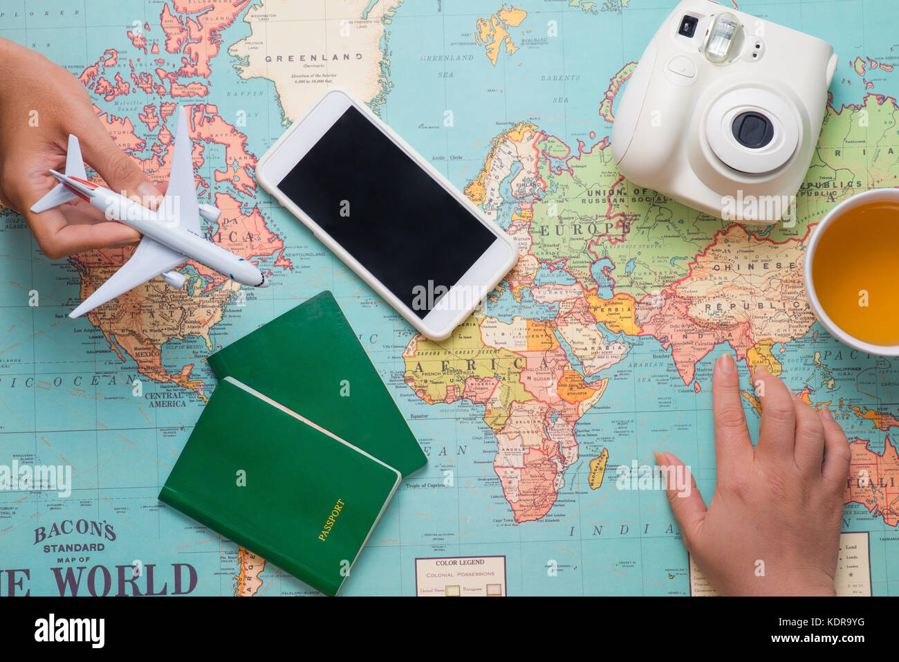 Travel. Trip. Vacation - Top view of airplane, camera, passport and ...