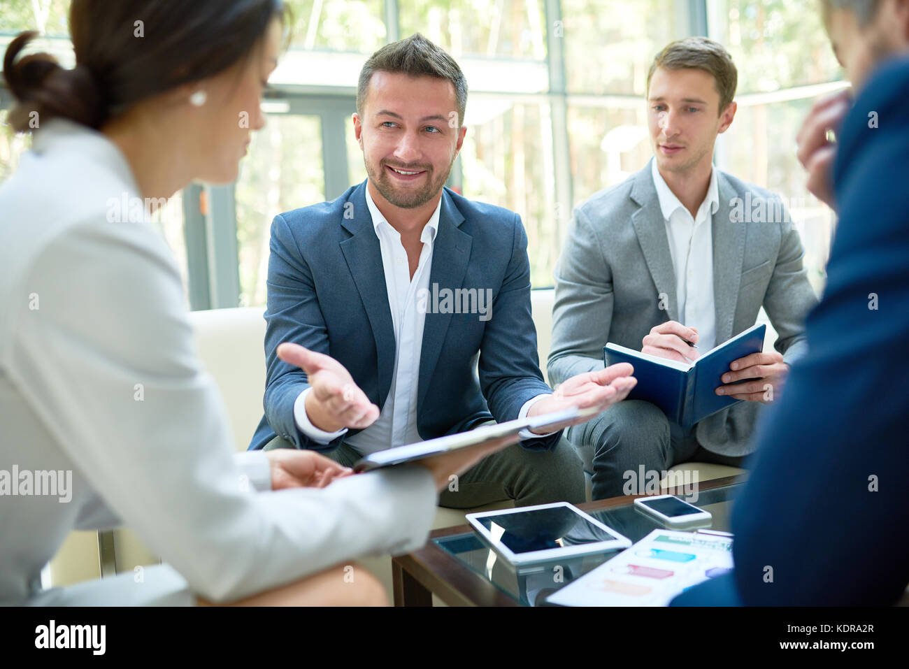 Sharing Ideas with Colleagues Stock Photo - Alamy