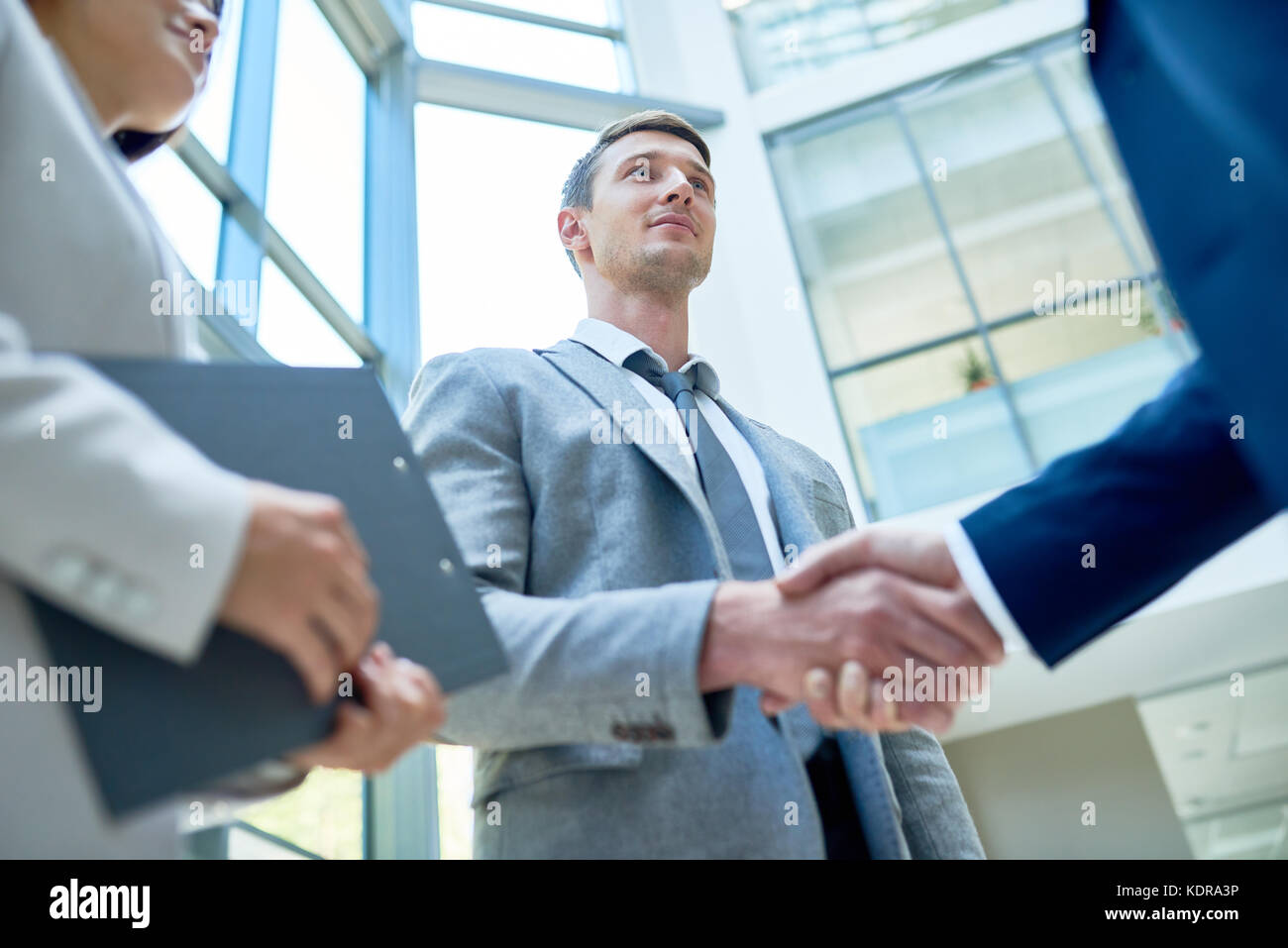 Firm Handshake of Business Partners Stock Photo - Alamy