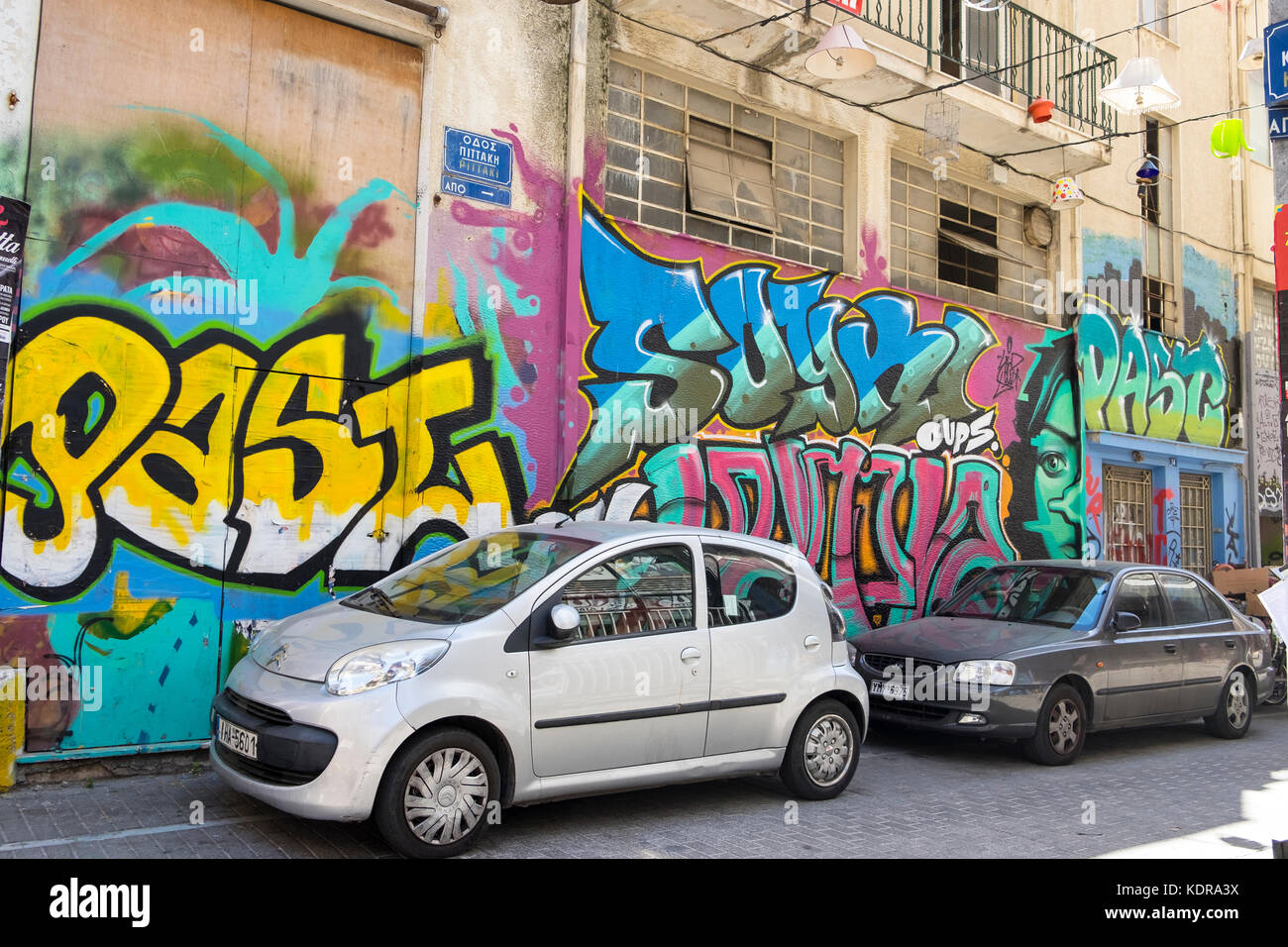 graffiti in Athens, typical houses in Athens Stock Photo - Alamy