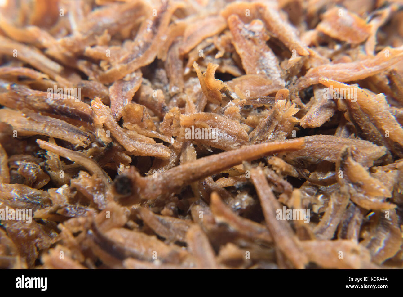 close up of fried anchovies for background Stock Photo - Alamy