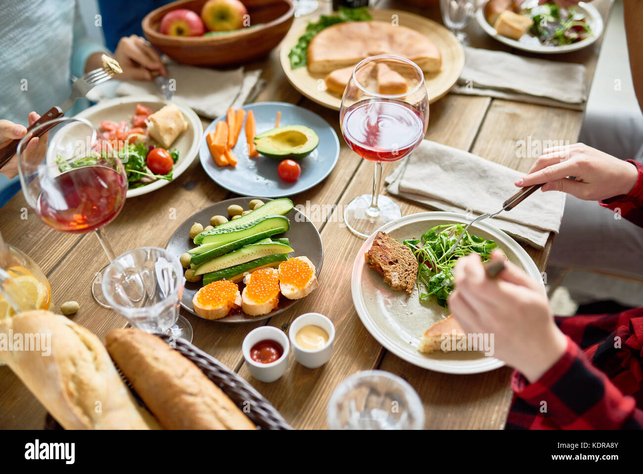 People Enjoying Delicious Dinner Stock Photo - Alamy