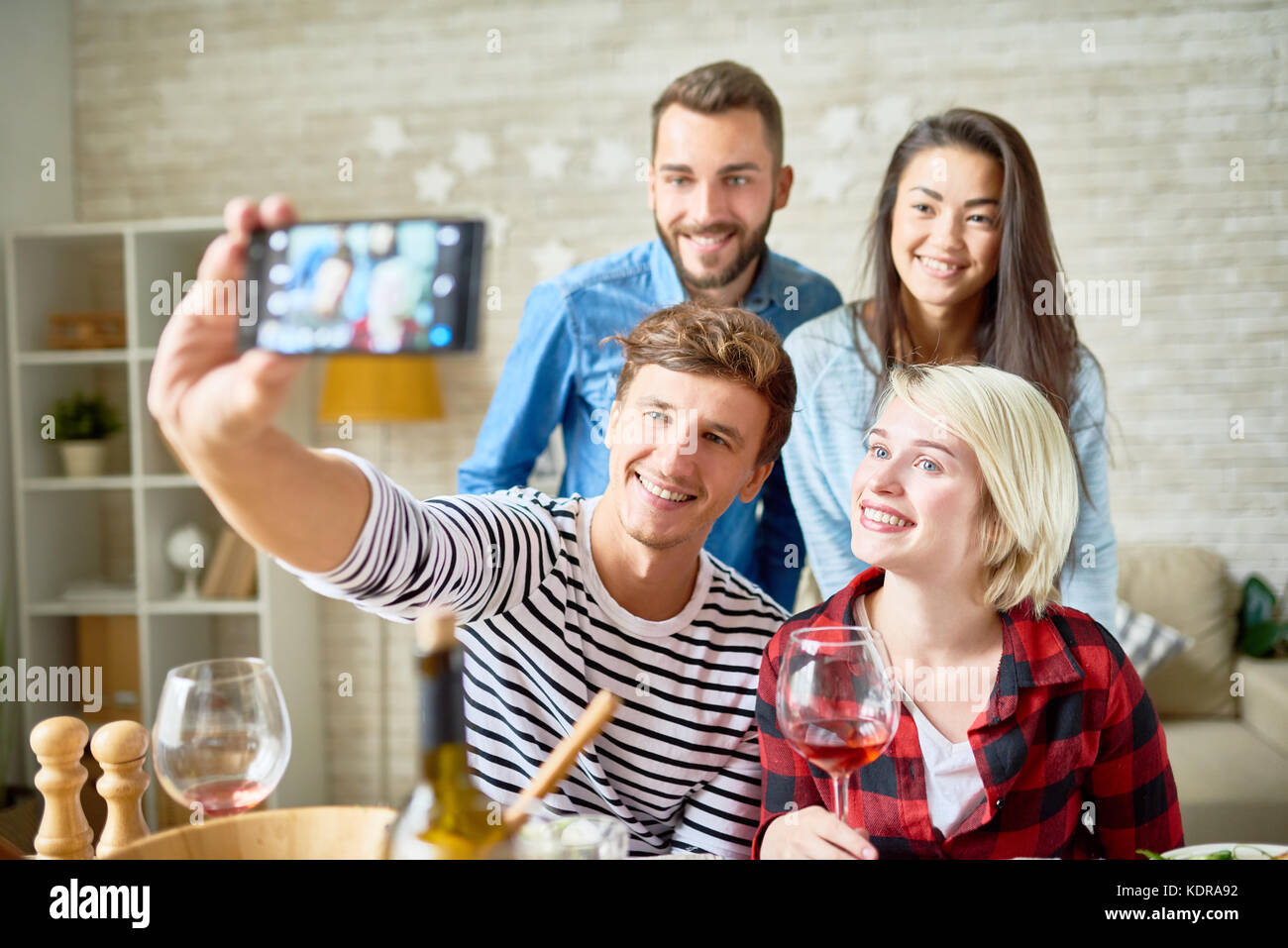 Young family posing hi-res stock photography and images - Alamy