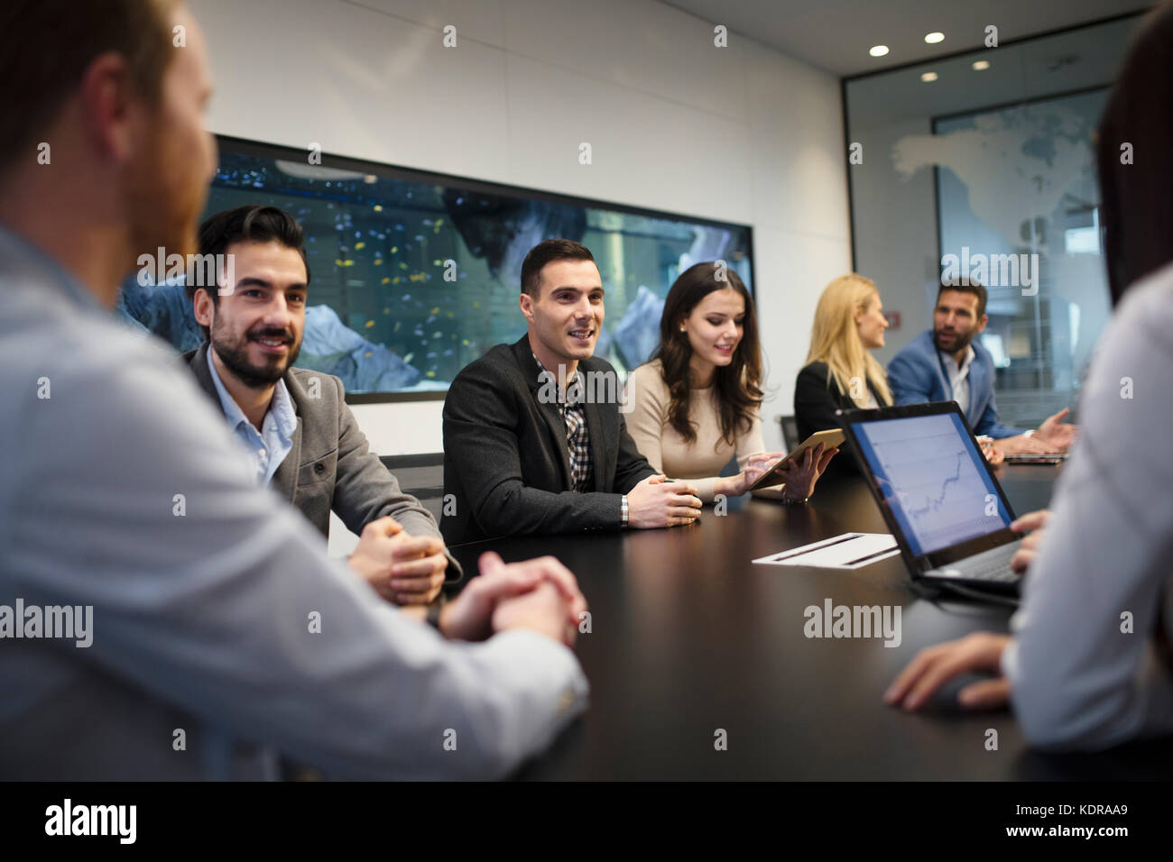 Perspective businesspeople having meeting in conference room Stock Photo - Alamy