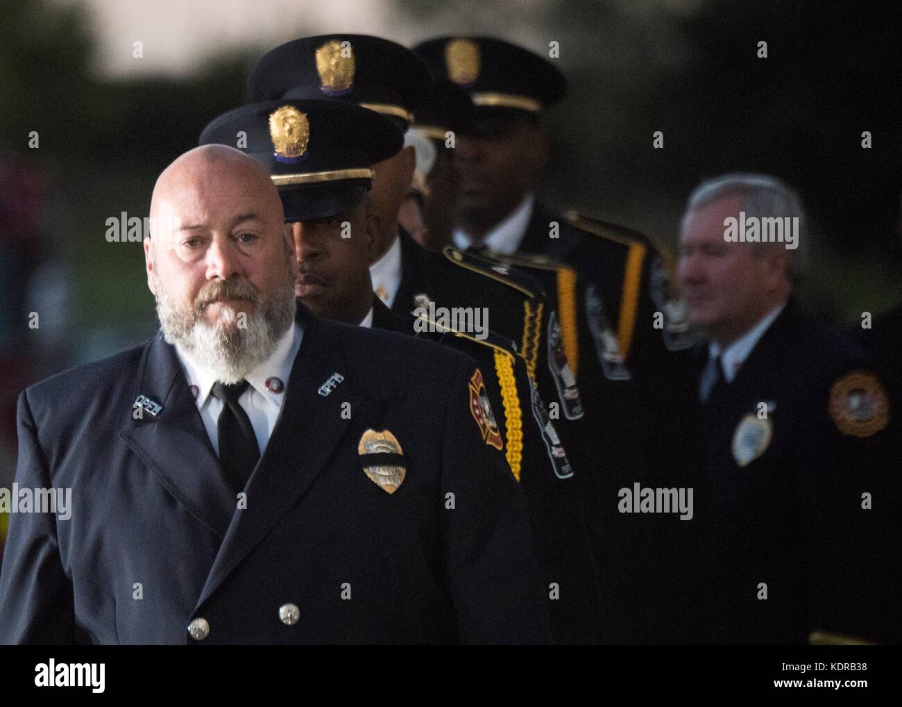 U.S. First Responders march in formation during the 9/11 Observance ...