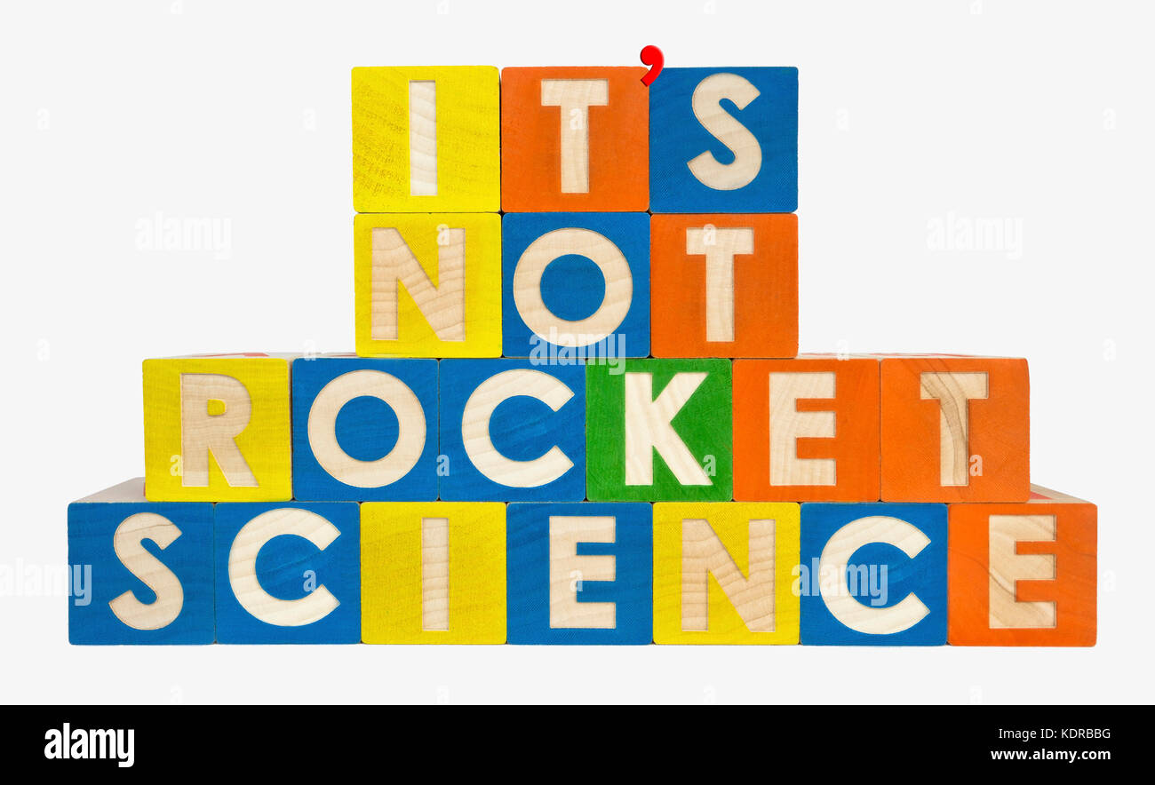 IT'S NOT ROCKET SCIENCE concept spelled with toy blocks. Isolated Stock ...