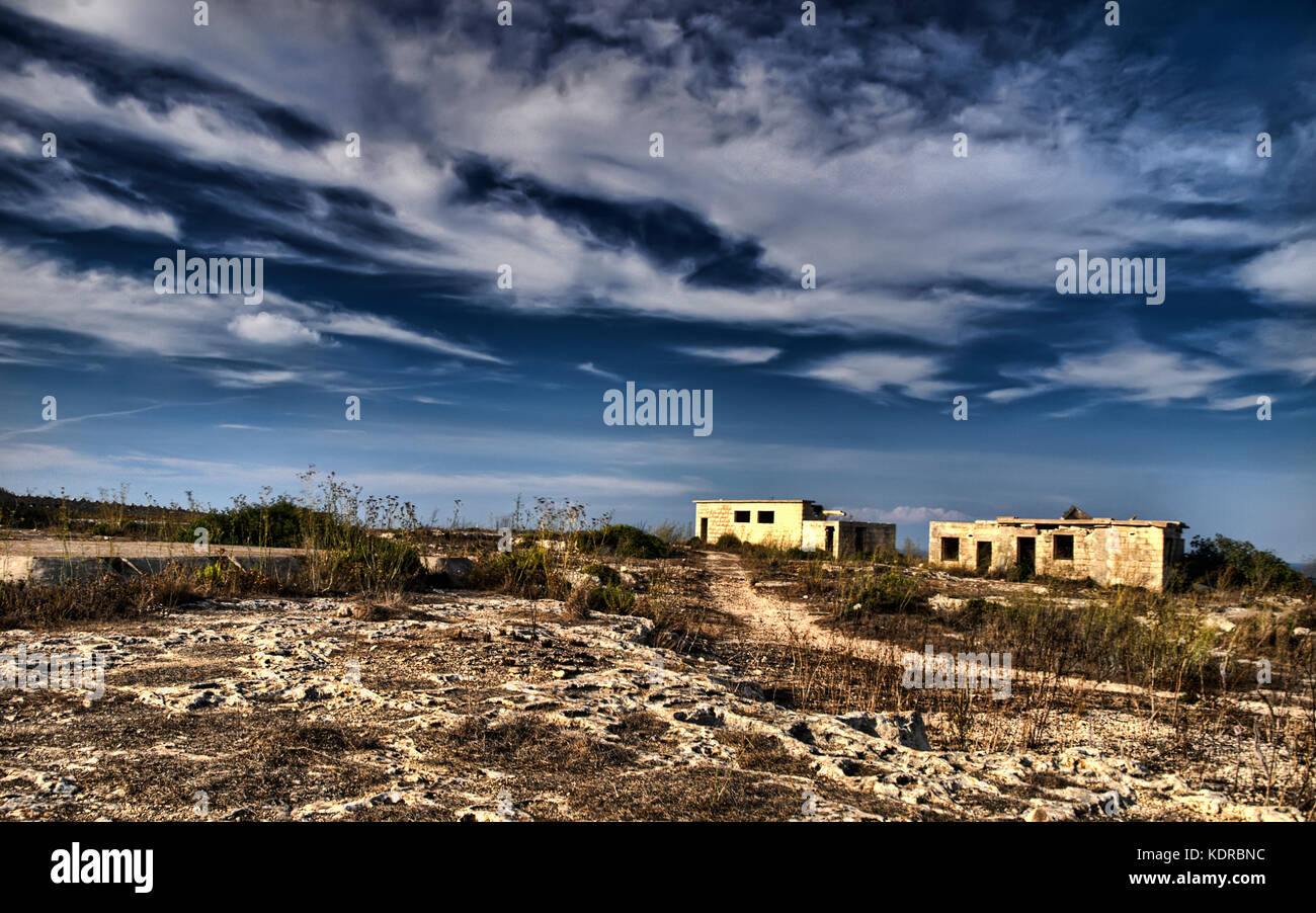 Derelict wartime British barracks lying in ruins at Selmun in Malta ...