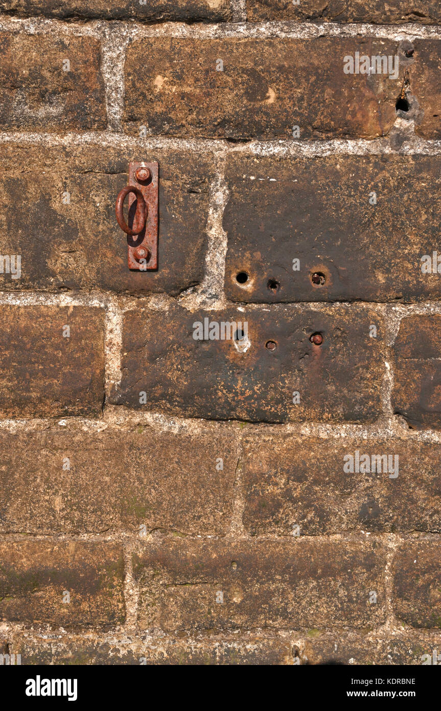 Old Stonewall Background Rusted Iron Ring Stock Photo - Alamy