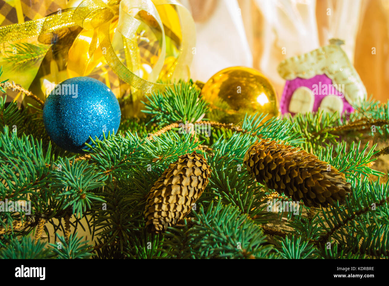 traditional Christmas background with Christmas tree, balls, cones and ...