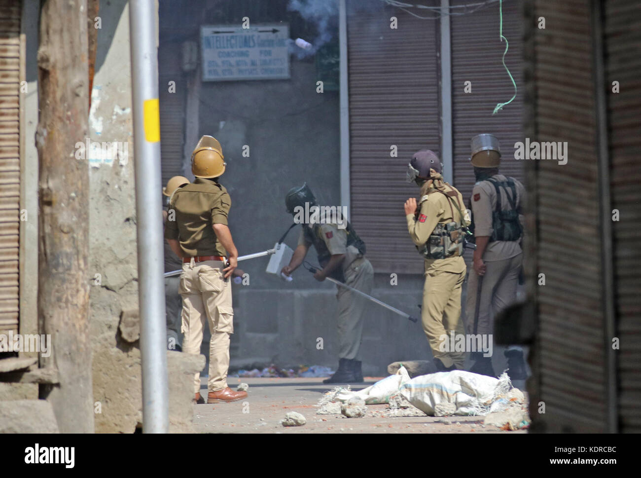 India. 15th Oct, 2017. Indian police men fired shear gas shell towards ...