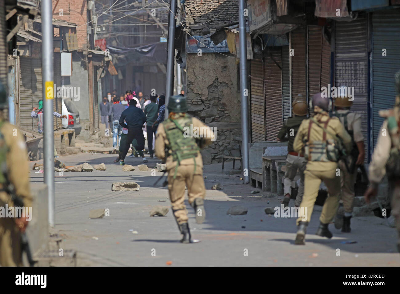 India. 15th Oct, 2017. Protester run as Indian police fired shear gas ...
