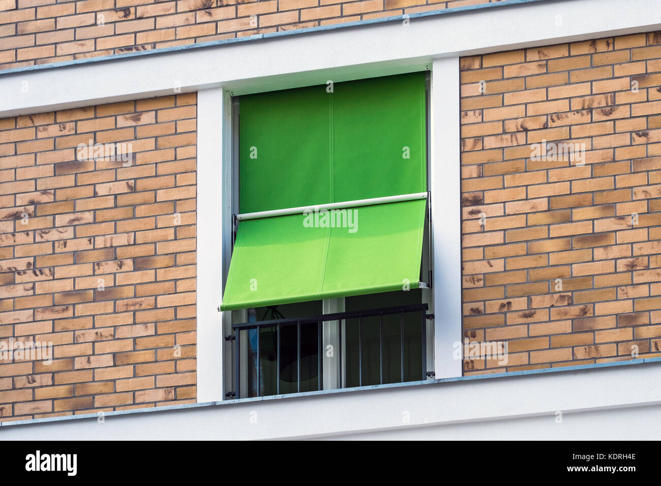 window with outdoor sunblinds - fabric blinds on window exterior Stock ...