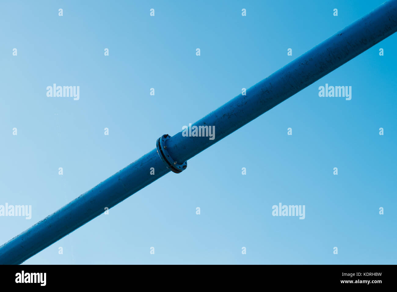 pipe connection - connected blue water pipeline Stock Photo - Alamy