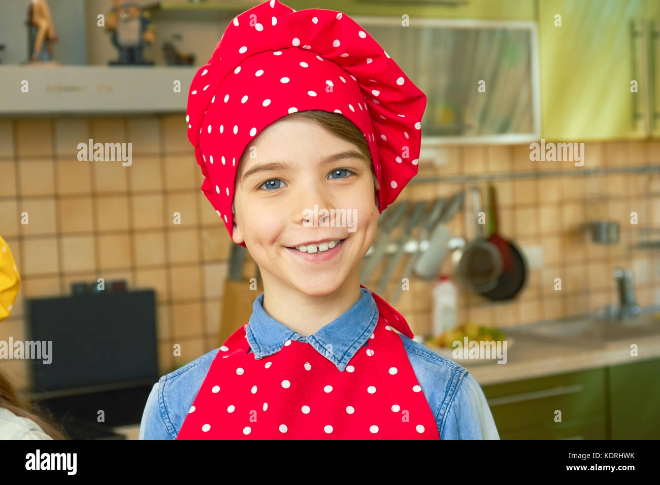 Smiling boy in chef hat Stock Photo - Alamy
