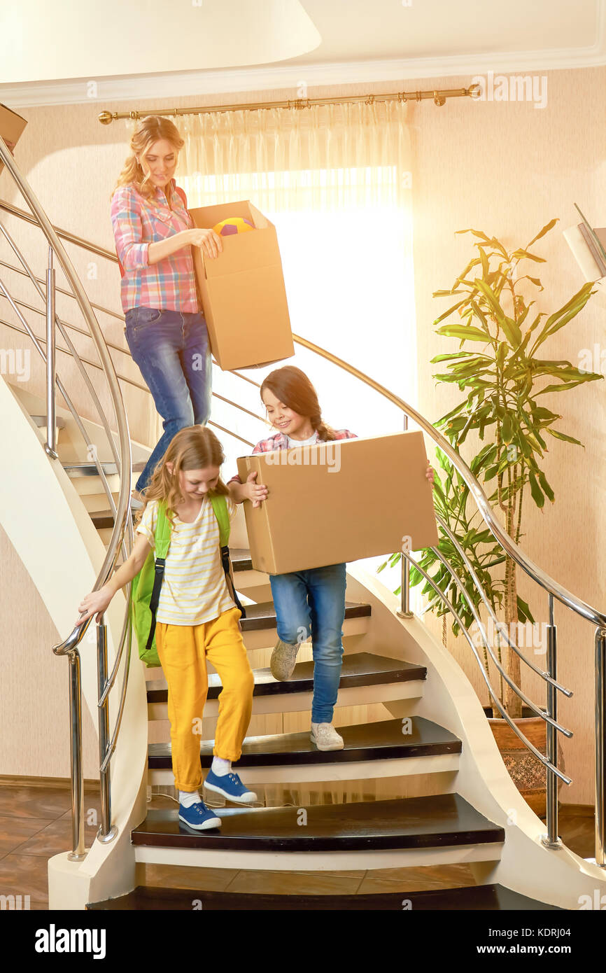 People with cardboard boxes Stock Photo - Alamy