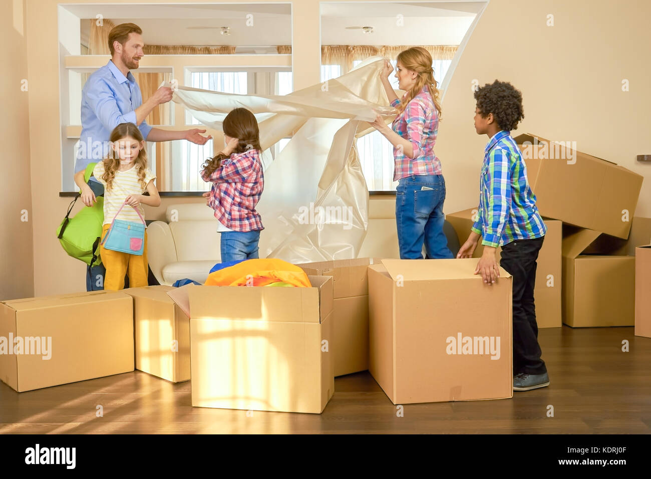 Parents and kids, relocation Stock Photo - Alamy