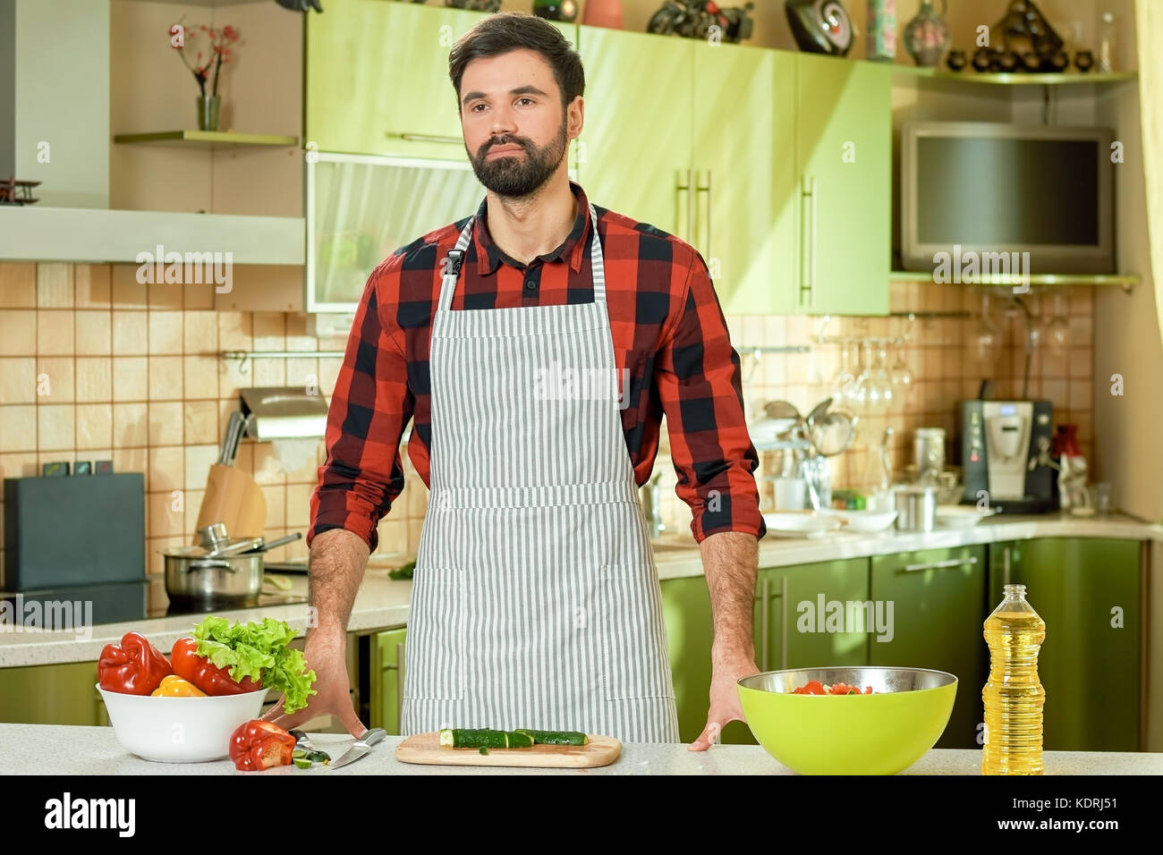 Man in the kitchen Stock Photo - Alamy
