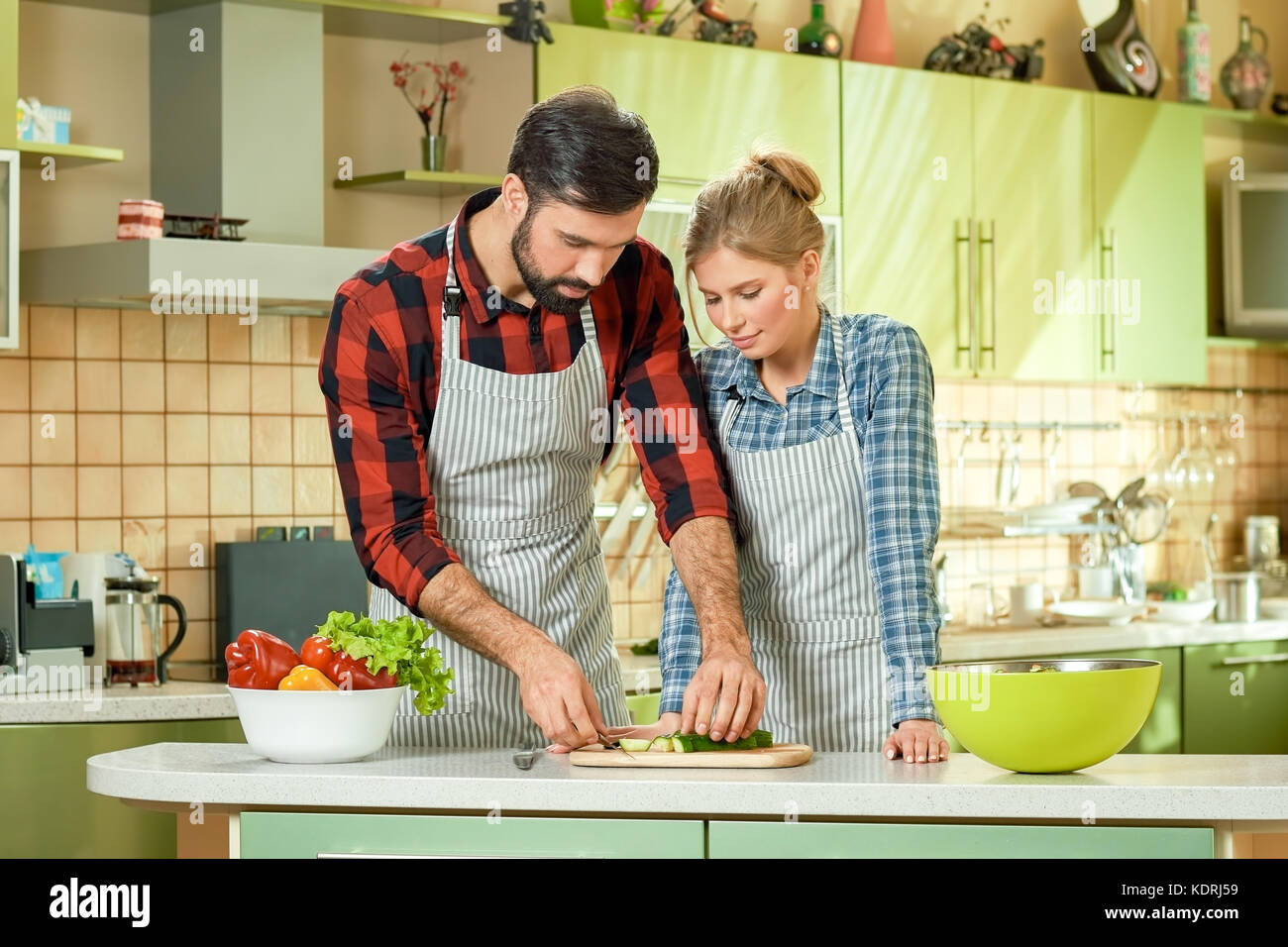 Couple preparing fresh meal hi-res stock photography and images - Alamy