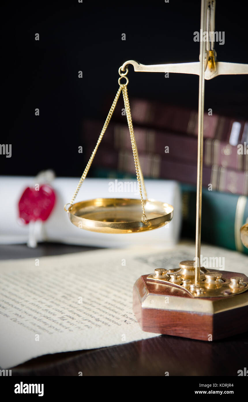 Weight scale in courtroom. Legal system justice concept Stock Photo - Alamy