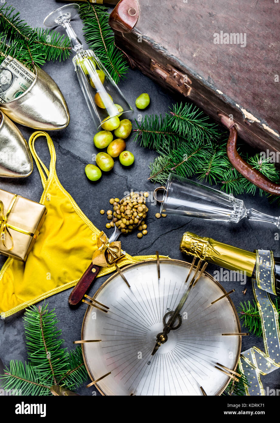 LATIN AMERICAN AND SPANISH NEW YEAR TRADITIONS. empty suitcase, lentil ...