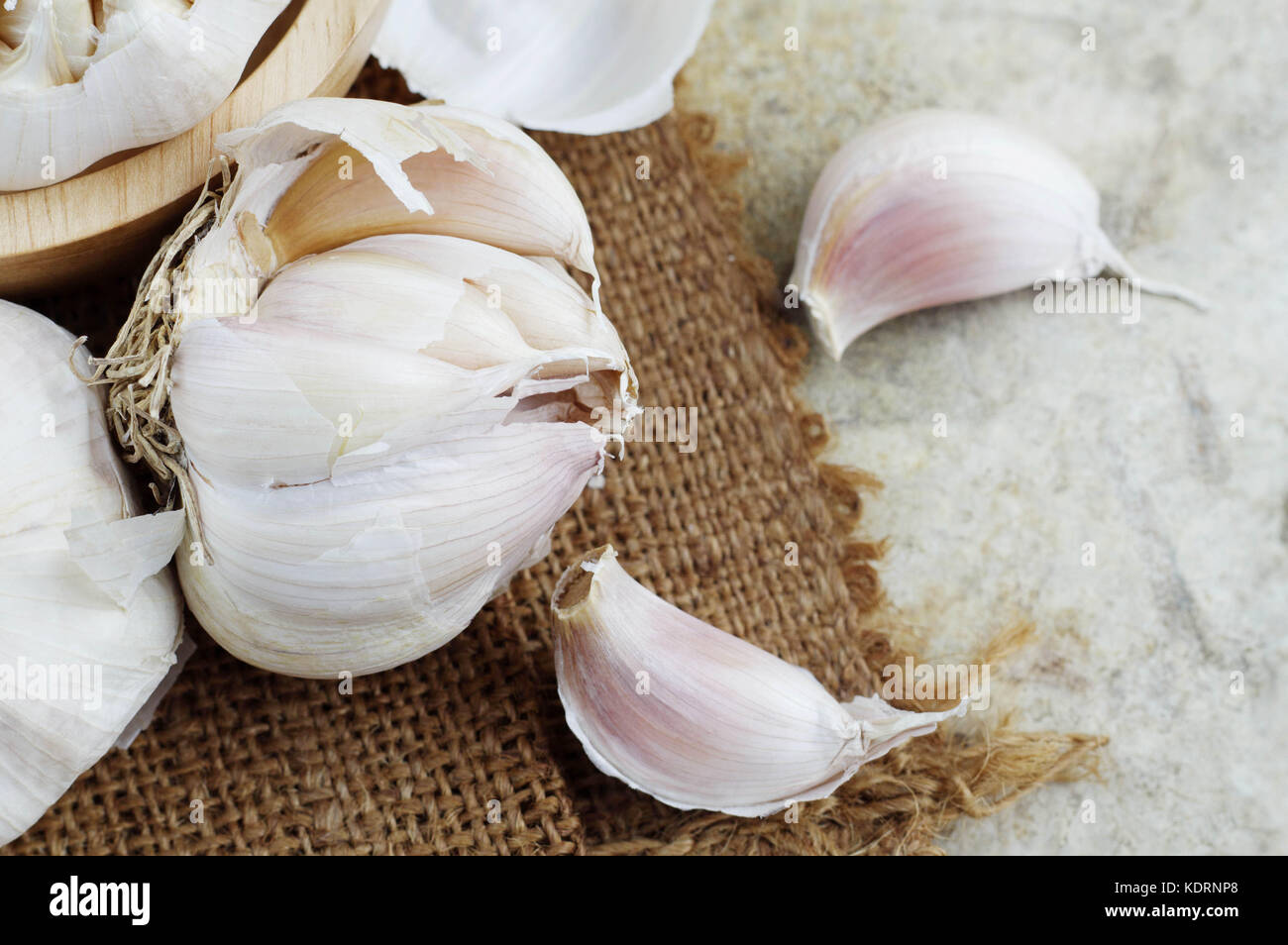 dried garlic on a sack with top view Stock Photo - Alamy