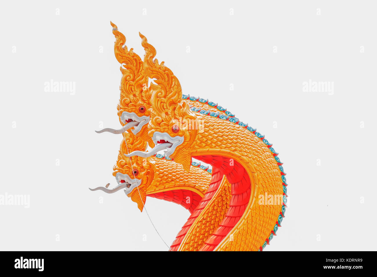 Golden naga statue on a white background Stock Photo - Alamy