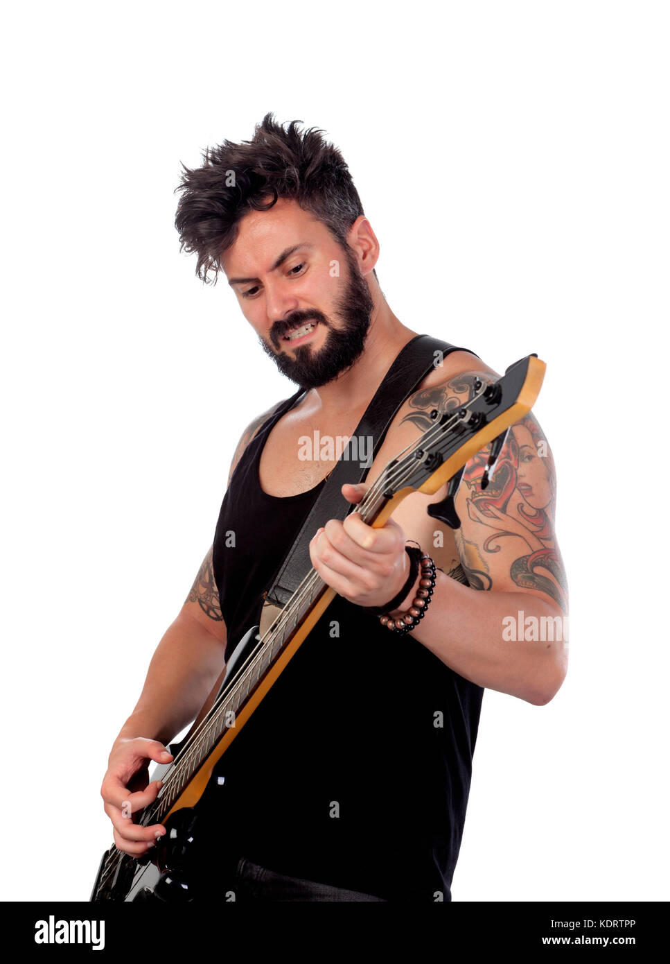 Attractive guy in black playing electric bass isolated on a white ...